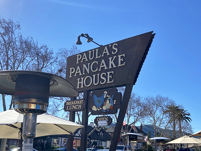 That vintage sign has welcomed hungry travelers for decades, promising Danish pancakes and delivering breakfast happiness every single time.