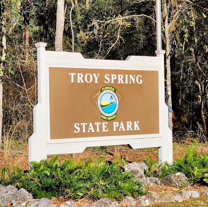 The official welcome sign promises natural wonders beyond. Like the cover of a book you can't wait to dive into&mdash;literally.