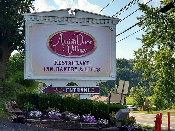 The roadside sign promises more than just a meal—it's advertising a complete Amish Country experience that begins the moment you turn in.