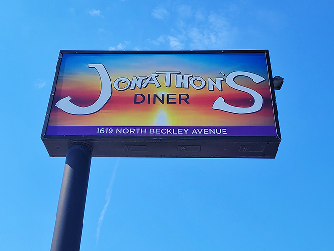 The roadside sign glows against the Texas sky, a North Beckley Avenue landmark that's guided hungry travelers to breakfast bliss for years.