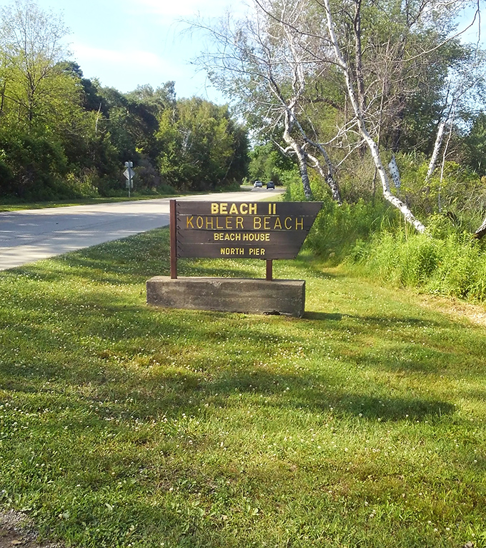 Beach 11's sign welcomes visitors to their sandy destiny &ndash; Kohler Beach, where memories are mandatory.