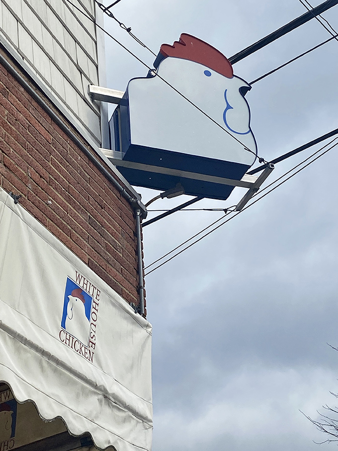 The iconic White House Chicken sign watches over Barberton like a poultry guardian angel, guiding hungry pilgrims to crispy salvation.