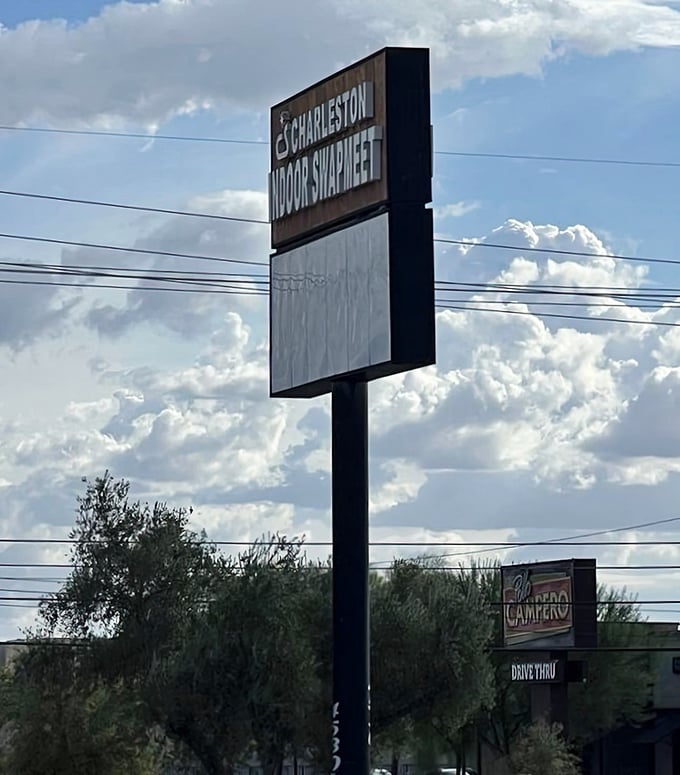 Standing tall against the Nevada sky, this sign beckons bargain hunters like a lighthouse guiding ships to treasure-filled shores.