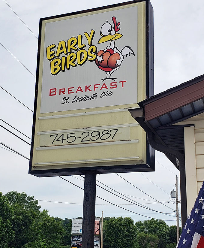 The cheerful rooster sign stands as a beacon of breakfast hope along Mt. Vernon Road, promising morning delights to those wise enough to stop.