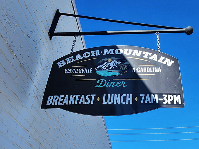 The sign that promises breakfast and lunch dreams will come true. Like a lighthouse guiding hungry travelers to flavor salvation.