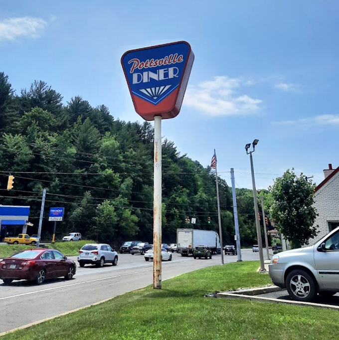 The classic roadside sign has weathered seasons and trends, standing tall as a landmark for locals and a discovery for travelers passing through.