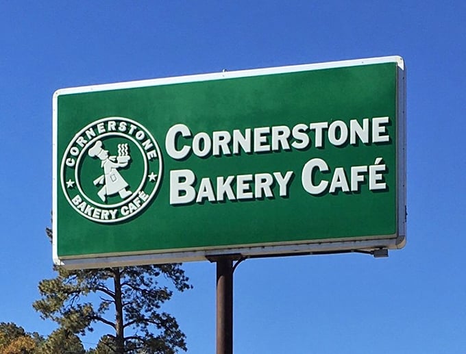 That green sign against the New Mexico blue sky is more than just a logo—it's a beacon of breakfast hope for hungry travelers.
