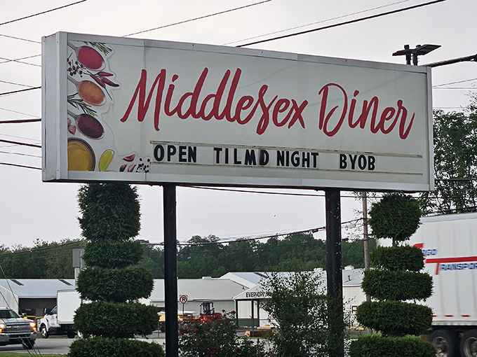 The roadside sign promises late-night eats and BYOB options&mdash;a beacon of hope for hungry travelers and locals alike.