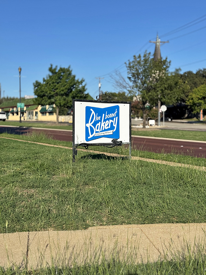 The roadside sign stands as a beacon of hope for the hungry, promising that paradise is just a parking spot away.