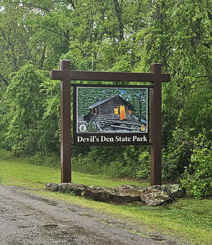 The gateway to geological wonders—this unassuming sign marks the entrance to a 2,500-acre playground that truly lives up to its dramatic name.