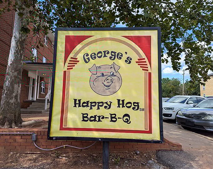 That sign doesn't just mark a restaurant—it marks a destination. The happy hog knows what awaits you, and he's smiling for good reason.