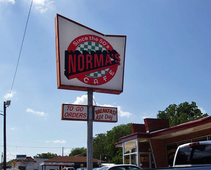 The iconic Norma's sign against a Texas blue sky &ndash; a beacon for hungry travelers that simply says, "You've arrived, and yes, we're still serving breakfast."