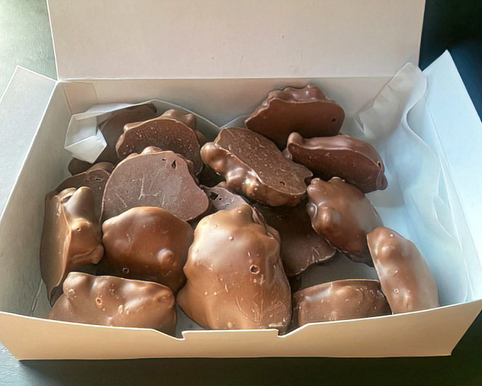 Chocolate-covered delights arranged like treasures in a jewel box. These aren't just candies&mdash;they're edible time machines to childhood bliss.