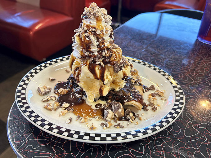 A dessert that understands the "go big or go home" philosophy. This Snickers pie isn't just served; it's unleashed upon your table with reckless abandon.