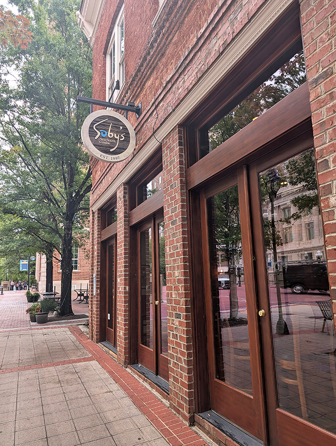 Soby's brick exterior and wooden doors hint at the New South cuisine waiting inside, where retirement celebrations feel both special and comfortably familiar.