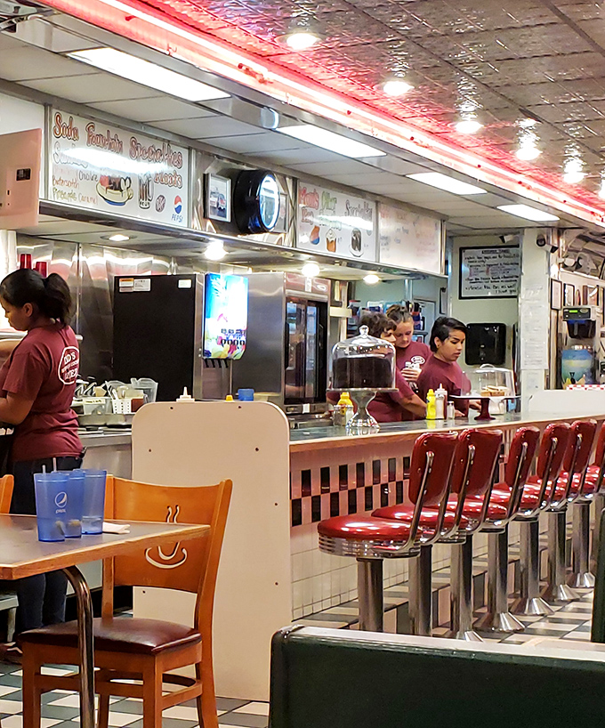 Behind the counter, the staff orchestrates the diner symphony, turning orders into edible memories with the efficiency of people who truly know their craft.