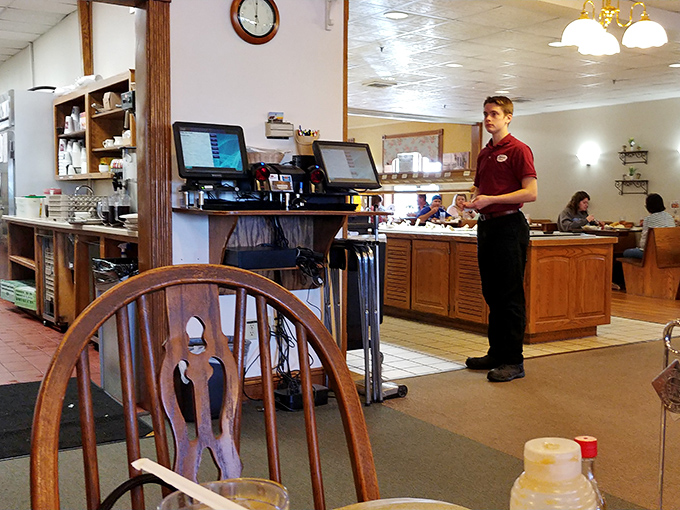 Staff ready to guide you through your culinary journey. That knowing smile says, "Yes, the pie is worth saving room for."