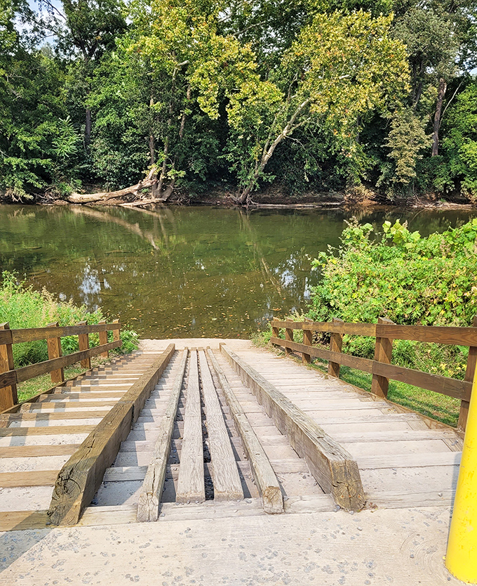 The river access ramp&mdash;where adventures begin, sneakers get wet anyway, and everyone remembers why they left the couch behind.