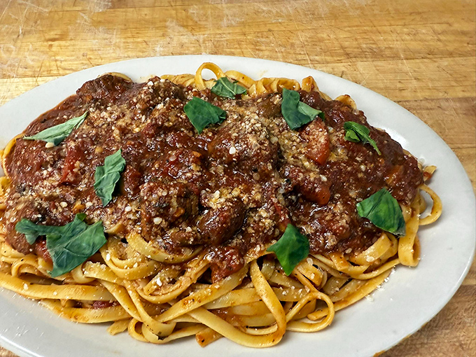 Homemade fettuccine with meatballs that aren't just food but time machines to Sunday dinners at your Italian friend's house you still dream about.
