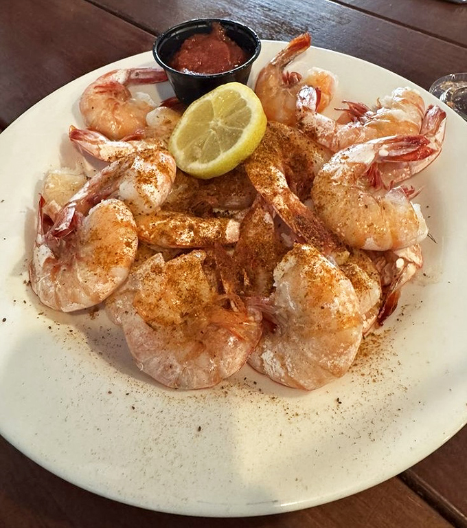 Steamed shrimp dusted with spices and served with a lemon wedge &ndash; nature's perfect finger food that makes you wonder why we bother with utensils at all.