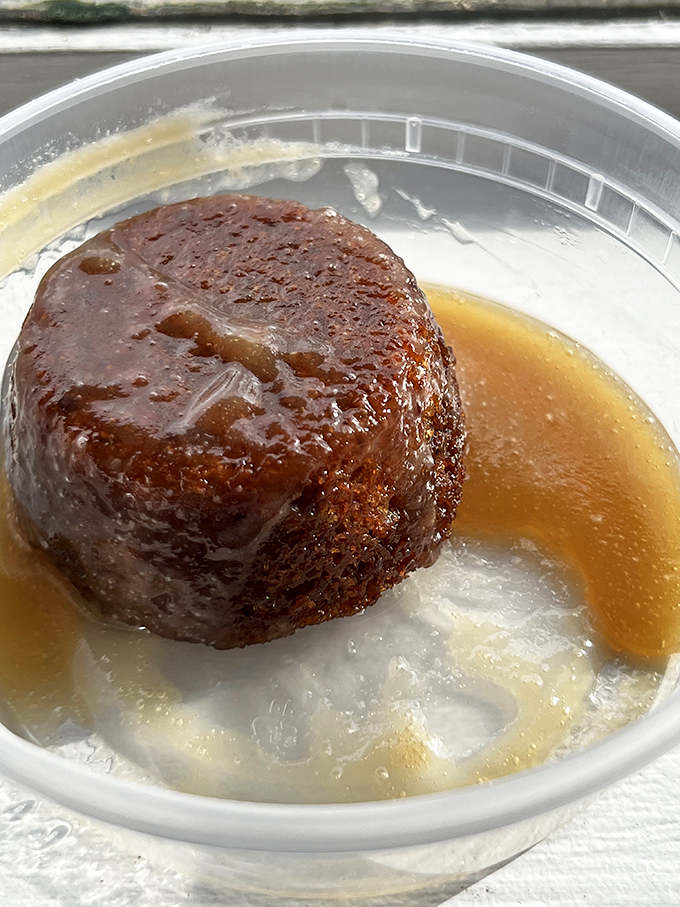 Sticky toffee pudding floating in a sea of caramel sauce&mdash;because even the most dedicated meat lover needs a sweet finale.