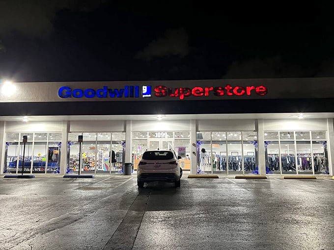 Even at night, the Goodwill Superstore glows with possibility, a beacon for early-morning thrifters planning their dawn raid strategy.