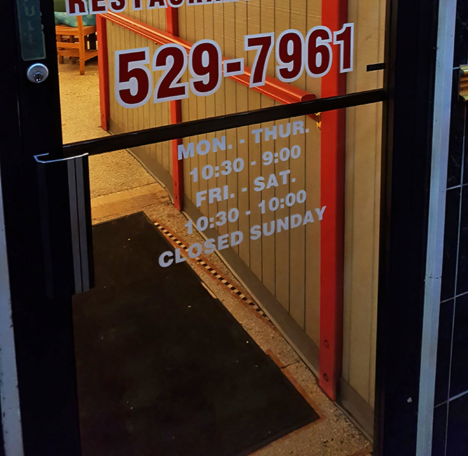 Business hours posted clearly&mdash;because knowing when you can get your seafood fix is essential information. The kind of detail that prevents culinary heartbreak.