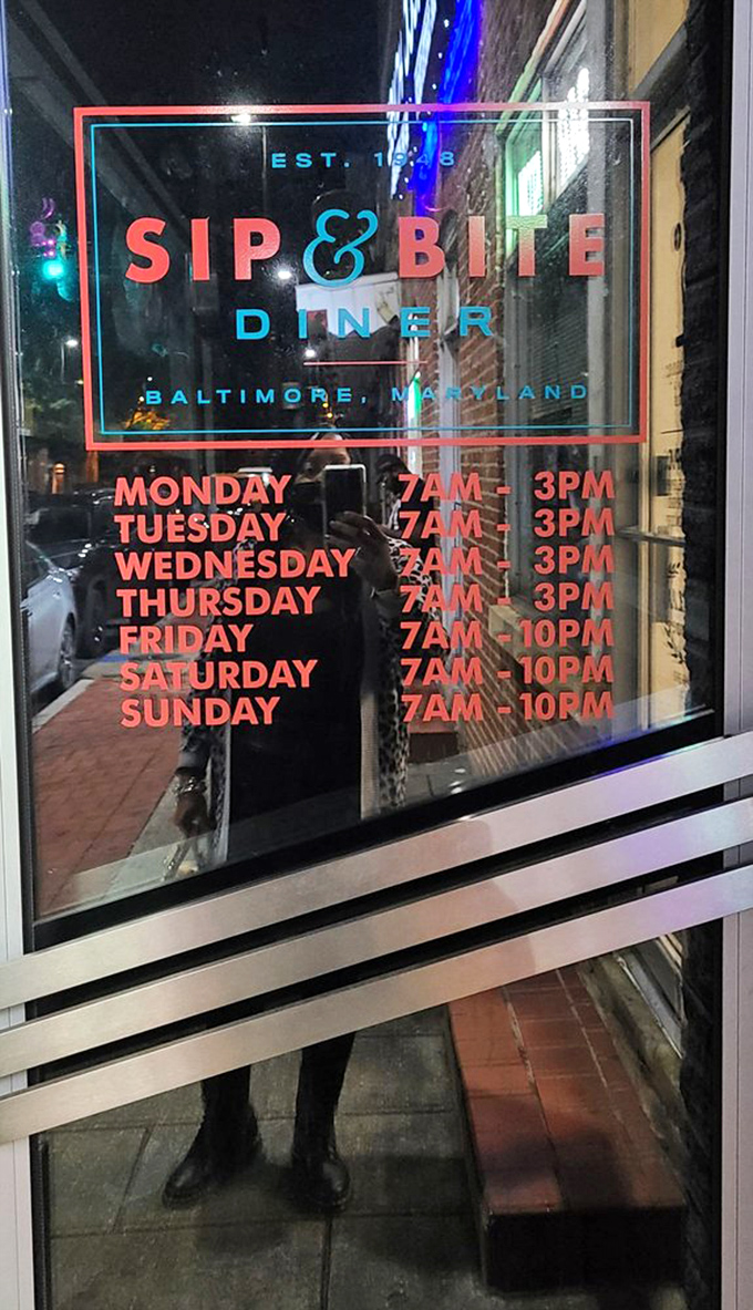 The hours posted on the door tell a story of early risers and night owls, all finding their way to this culinary lighthouse on Boston Street.