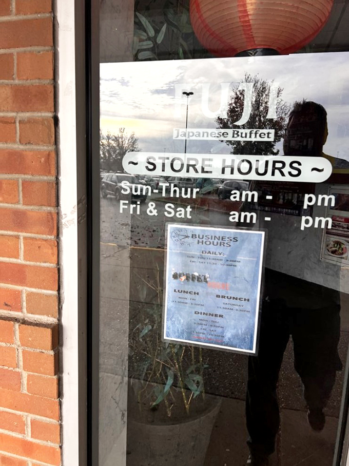Store hours posted clearly on the window - because knowing when paradise opens is half the battle won.