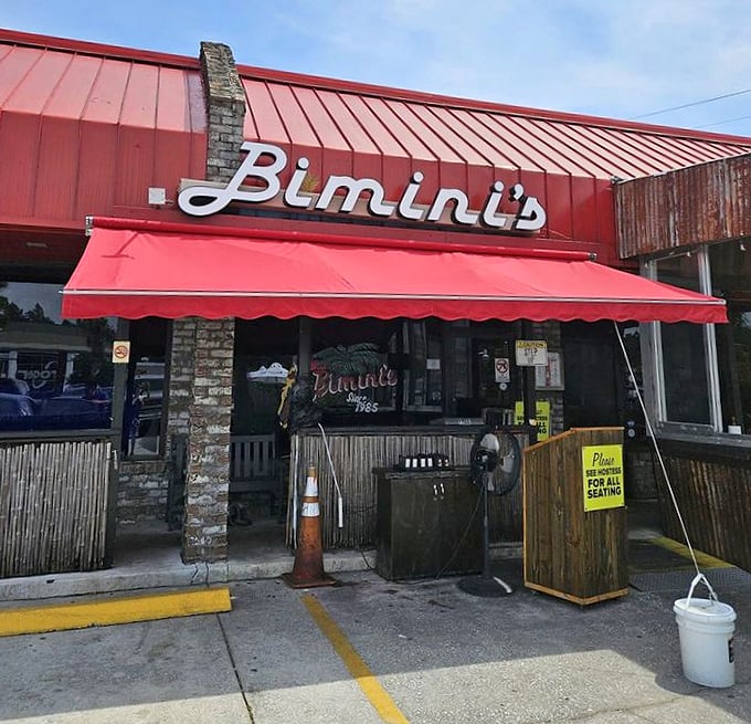 The red awning and stone facade &ndash; seafood architecture at its finest. No pretension, just a building focused on getting you to the good stuff inside.
