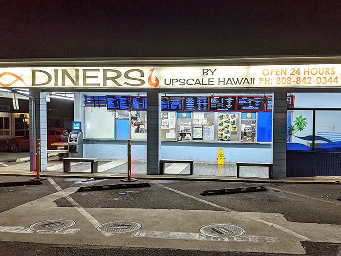 By night, the glowing storefront becomes a beacon for hungry souls. Like a lighthouse, but for your stomach.