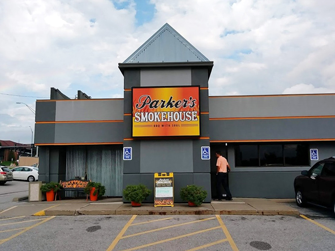 The storefront with its bright sign stands as a beacon of hope for the hungry. Like a lighthouse, but instead of safe harbor, it guides you to smoked meat paradise.