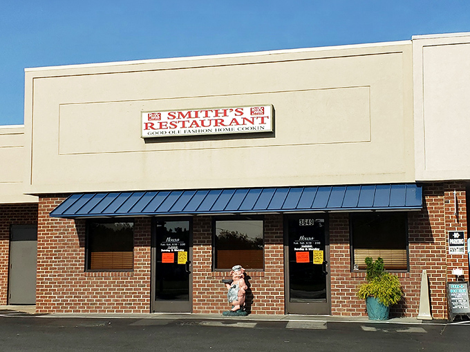 Morning light bathes the storefront as the little pig statue stands guard, welcoming hungry visitors to this temple of Southern cooking.