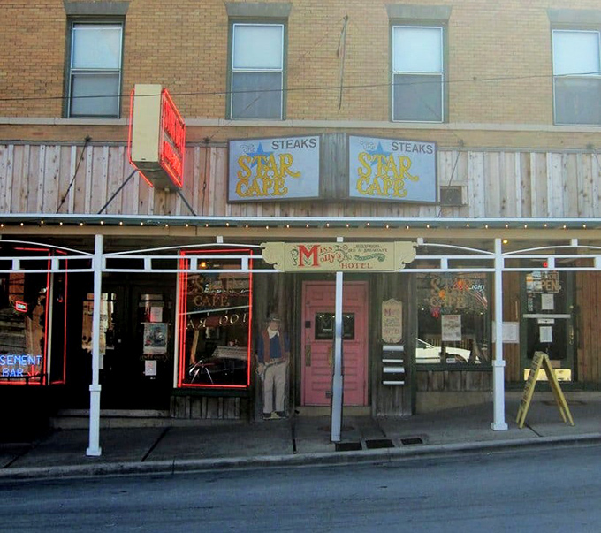 The storefront stands as a beacon of hope for hungry travelers&mdash;those blue "STEAKS" signs might as well say "SALVATION" for the famished.