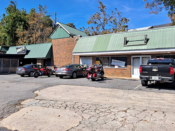 A parking lot filled with cars and motorcycles&mdash;universal symbols that something worth stopping for awaits inside those brick walls.