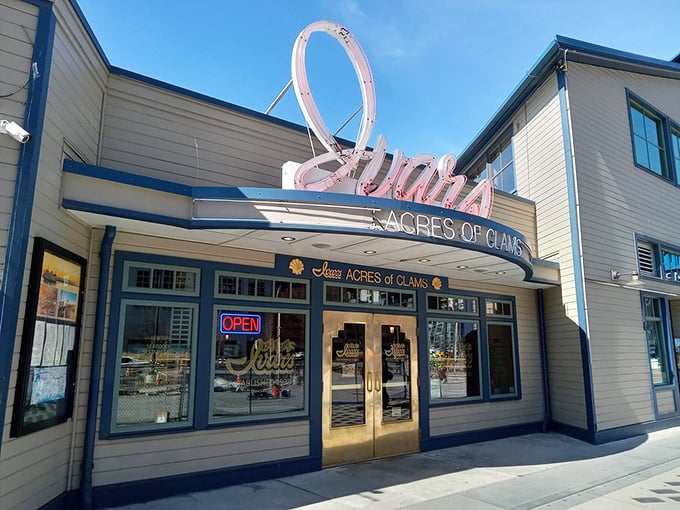 The retro neon sign glows like a seafood lighthouse, beckoning hungry travelers to dock at this Seattle institution.
