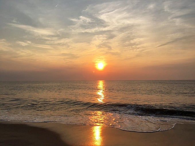 As the sun bids farewell, Dewey Beach's waters transform into a golden pathway leading to tomorrow's adventures.