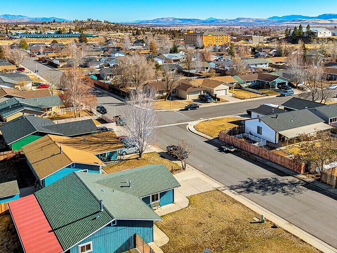 From above, Susanville's neighborhoods nestle between mountains like a quilt spread across nature's guest bed.