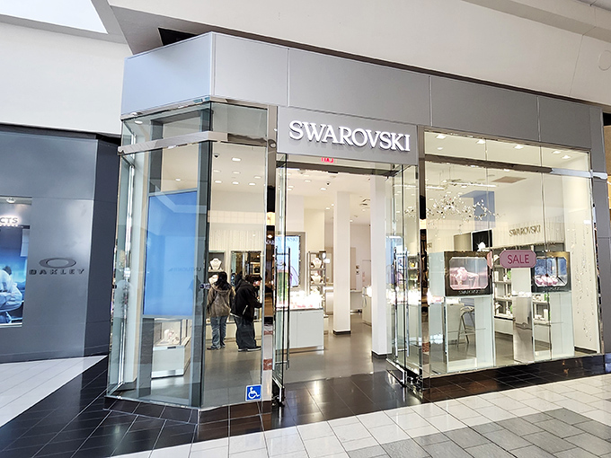 Swarovski's crystal kingdom sparkles with precision-cut temptations that somehow make you believe that yes, you do need a tiny glass penguin in your life.