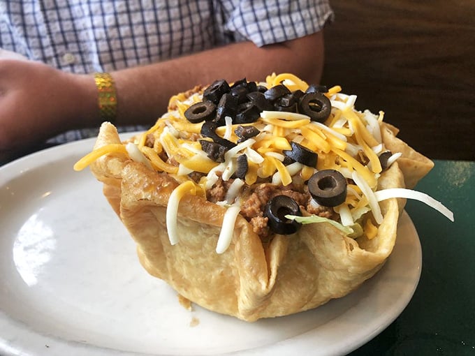 Taco salad served in an edible bowl because sometimes creativity makes everything taste better.