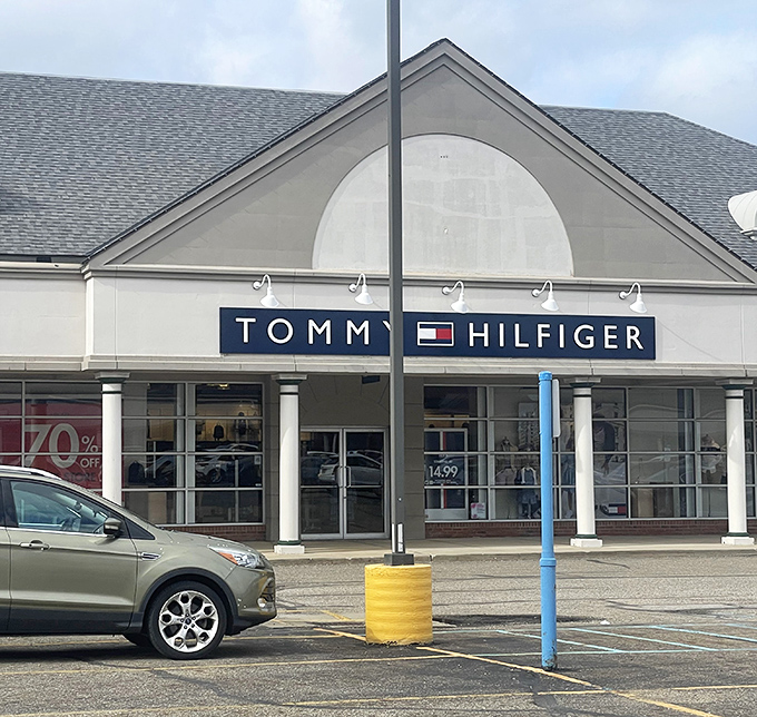 Tommy Hilfiger's classic American styling extends from its merchandise to its storefront&mdash;complete with signature navy and red branding.
