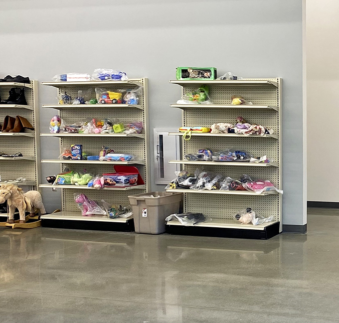 The toy section holds plastic promises of joy, where previously-loved playthings await their next adventure with eager young hands.