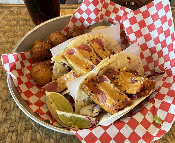 Tuna tacos that make Tuesday special any day of the week. The perfect harmony of fresh fish, crunchy slaw, and just enough kick.