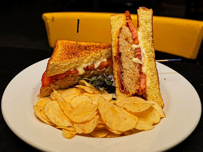 The Ultimate Grilled Cheese lives up to its name—golden, crispy bread barely containing the molten cheese within, with chips standing by for backup.