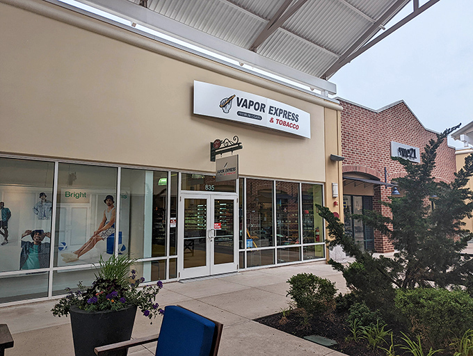 Tucked between fashion powerhouses, Vapor Express & Tobacco offers a different kind of retail therapy. Even in bargain paradise, there's room for life's little indulgences.