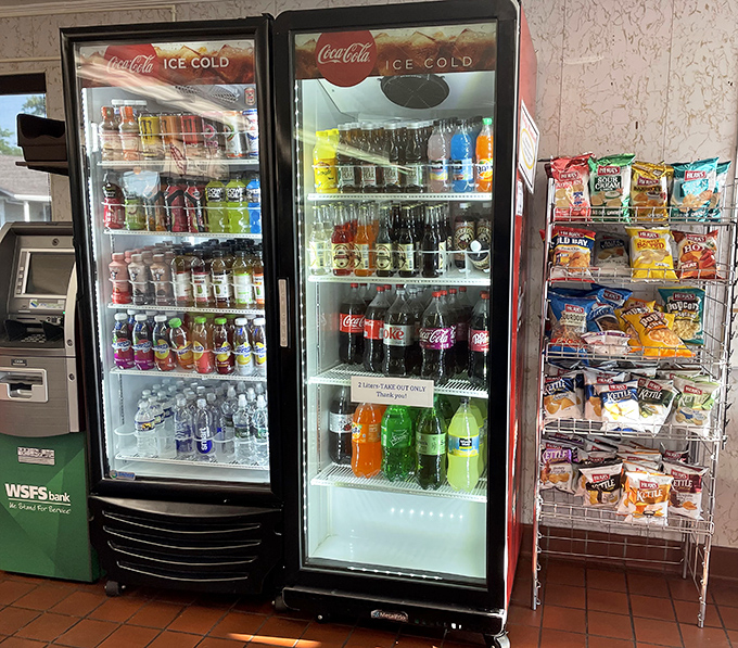 The drink cooler stands ready with every possible beverage pairing for your broasted chicken feast &ndash; though locals know an ice-cold cola is the traditional choice.