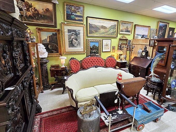 A perfectly curated Victorian parlor scene complete with paintings, furniture, and enough elegance for royalty.