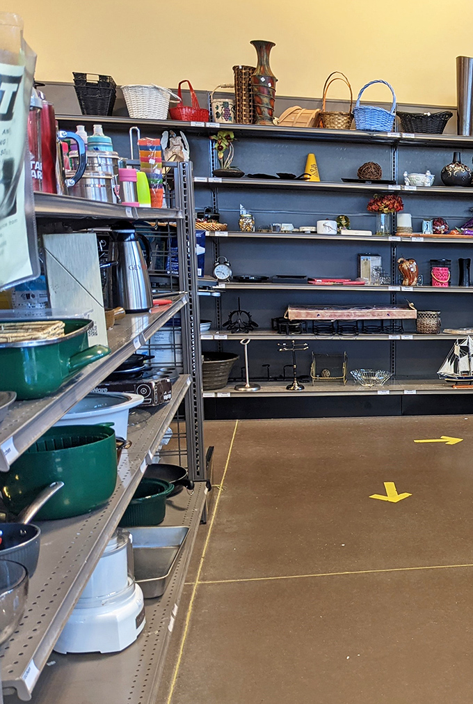 Kitchen essentials and home decor share space in this treasure trove corner. That green pot could simmer your next family stew or hold a thriving plant.