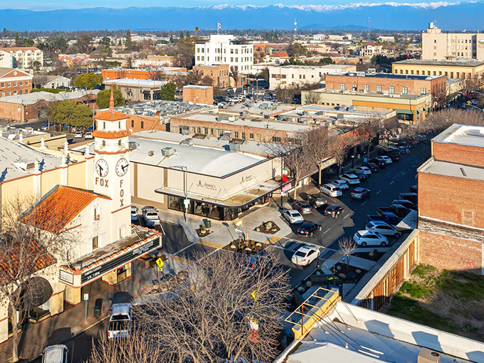 From above, Visalia's downtown grid reveals its walkable charm, with the Sierra Nevada mountains providing a majestic backdrop.
