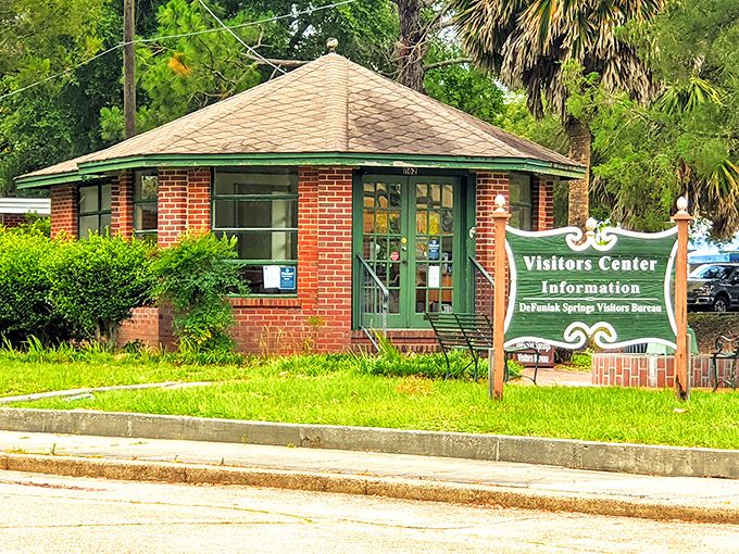 The brick Visitor Center, with its cheerful green trim, serves as DeFuniak Springs' welcome wagon – the human equivalent of a warm Southern handshake.